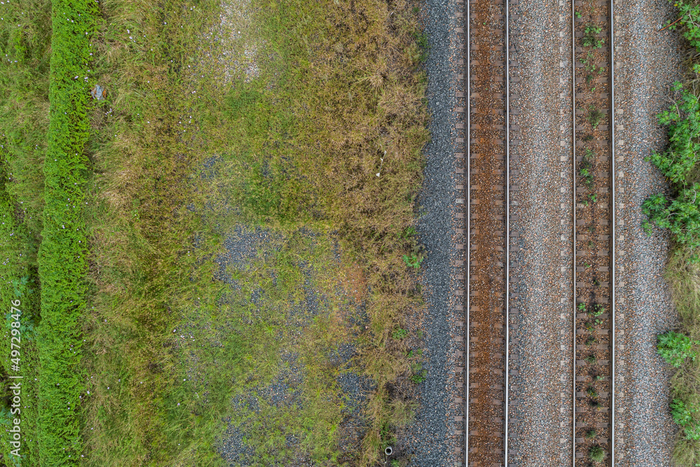 Top down view of railway line and grass beside train track Stock Photo ...