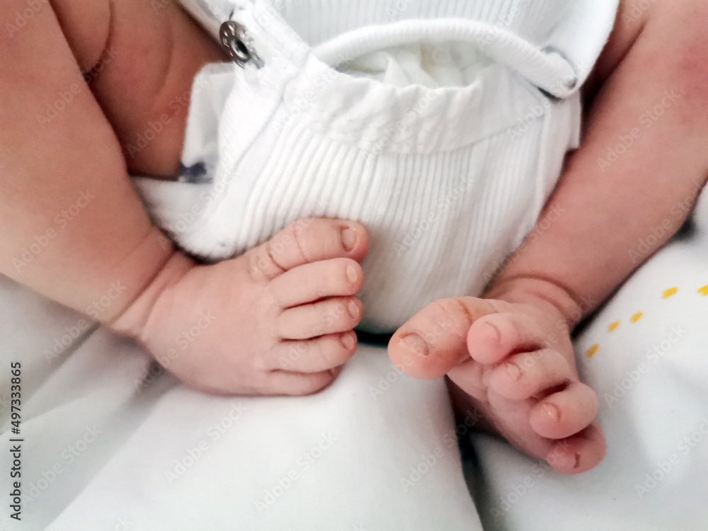 Newborn childs small feet photographed right after birth. Stock Photo ...
