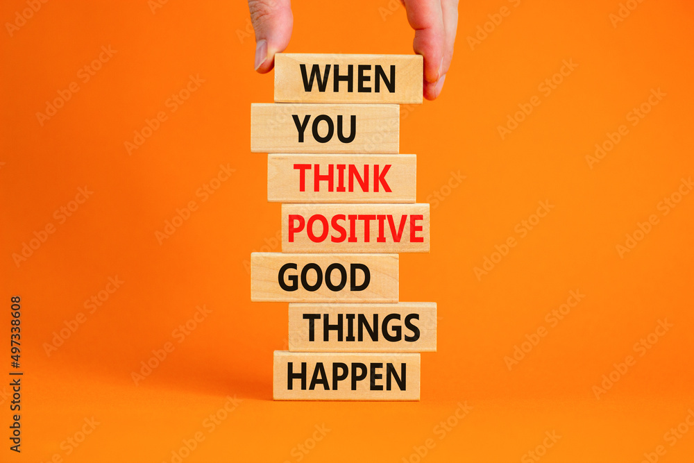 Think positive symbol. Wooden blocks with concept words When you think ...
