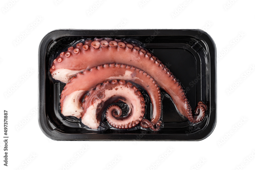 Vacuum packaging of fresh octopus tentacles for supermarket isolated on ...