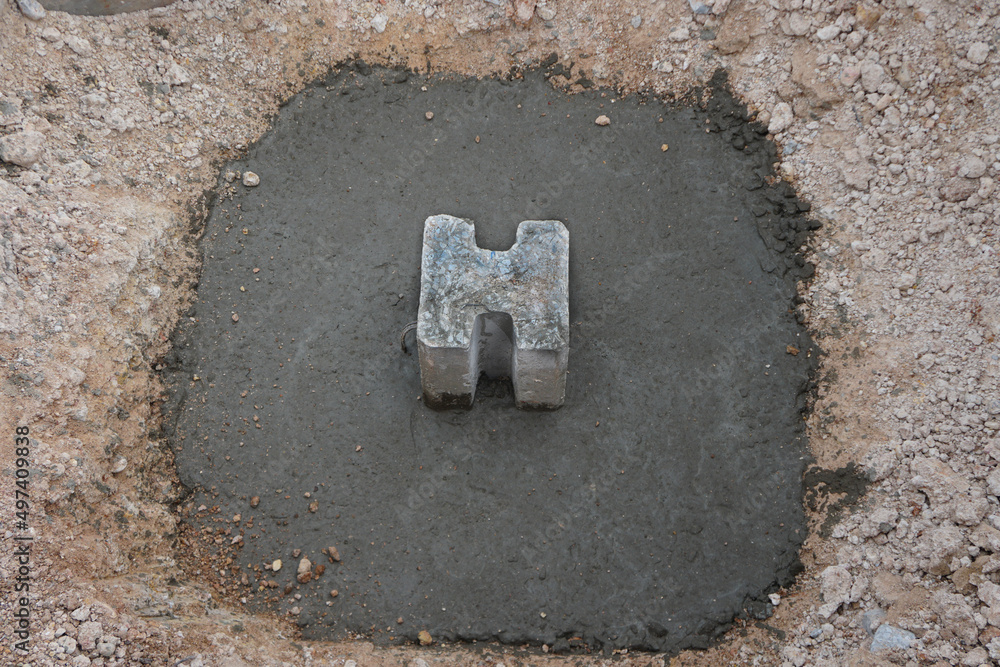 Foto de Lean or coarse concrete is poured over-leveled ground for ...