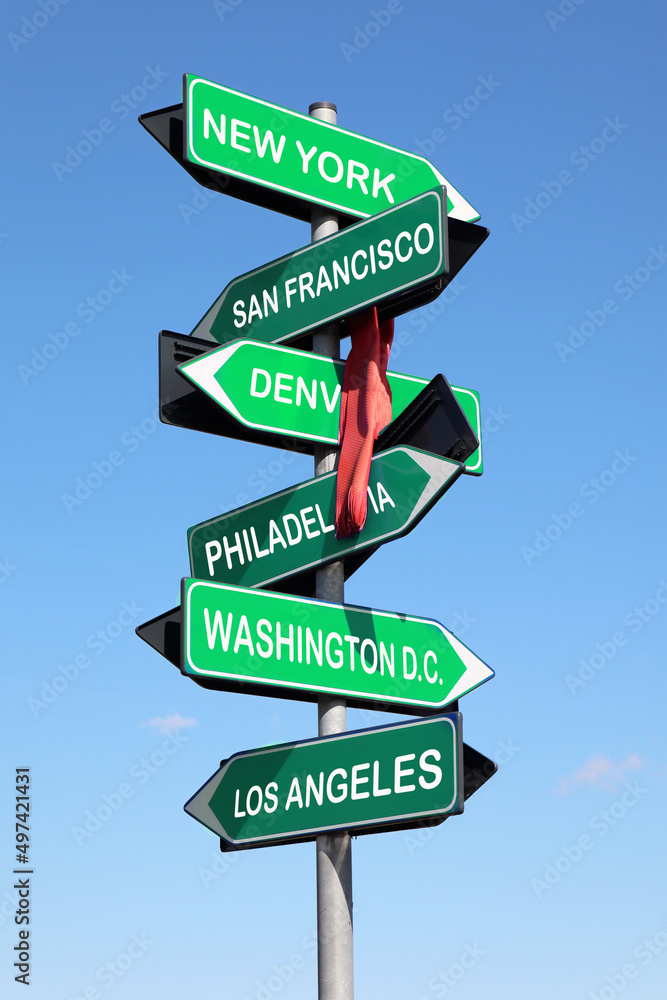 Road sign with names of American cities. New York, Washington, Los ...