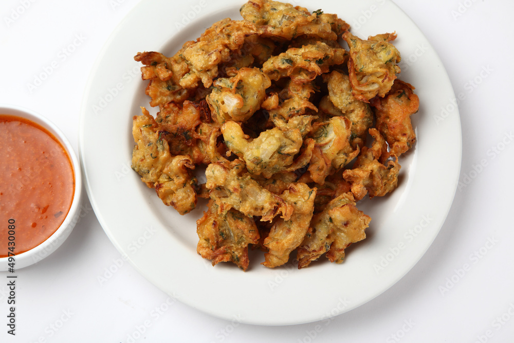 Fried onion pakora or Pyaj Pakoda also known as Crispy Kanda bhaji ...