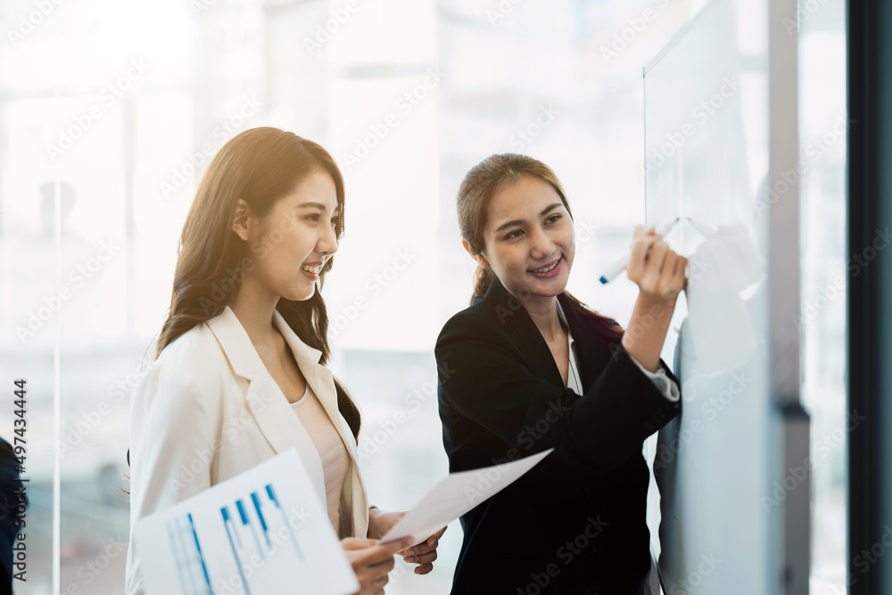 Business asian woman presentation conductor manager coach drawing ...