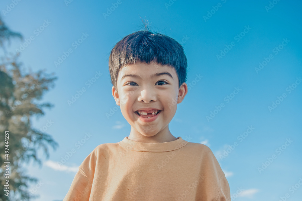 Happy Little Asian boy happy, Kid showing front teeth with big smile ...