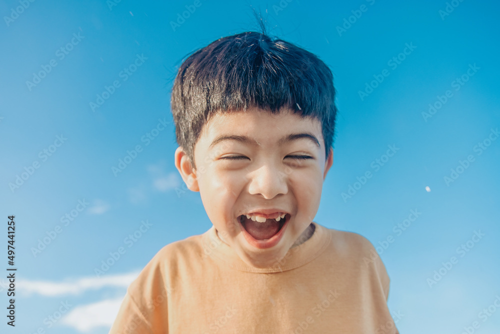 Happy Little Asian boy happy, Kid showing front teeth with big smile ...