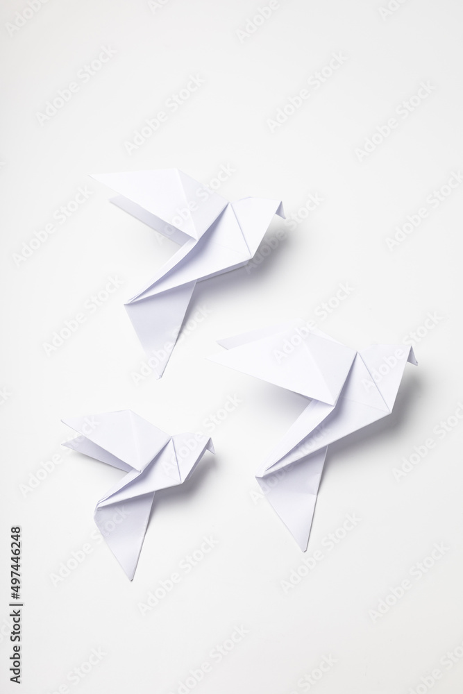 White dove origami as a symbol of peace on a white background Stock ...