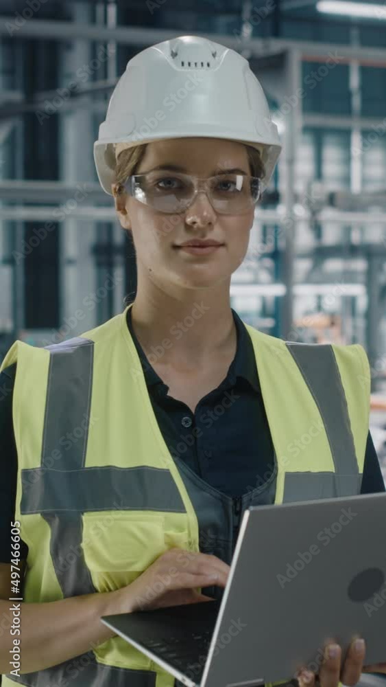 Vertical Portrait of Female Automotive Industry 4.0 Engineer in Safety ...