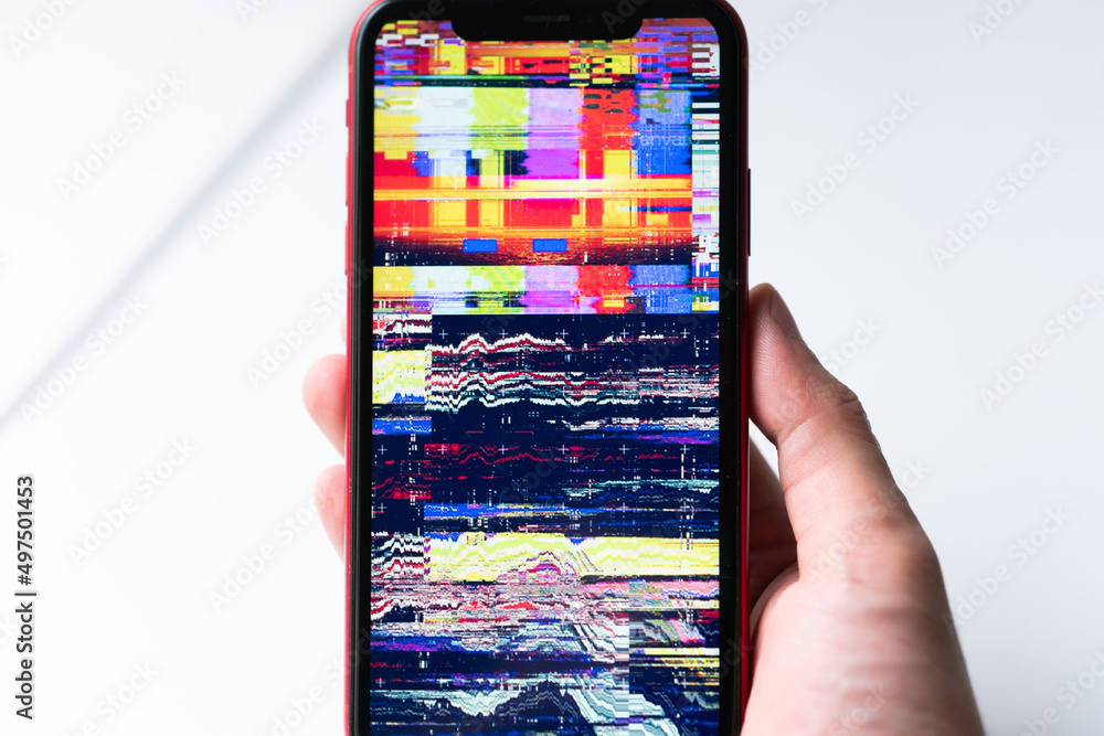 A Hand Holding Smartphone Mobile Phone Closeup Glitches Distorted Corrupted Image With