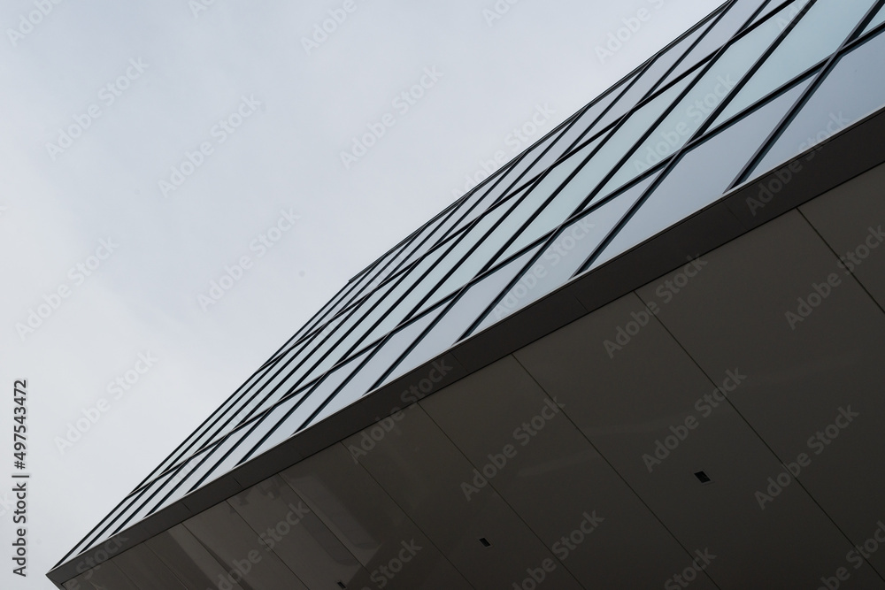 The exterior wall of a contemporary commercial style building with ...