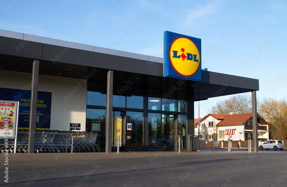 Lidl shop entrance, with brand logo signboard. German international ...