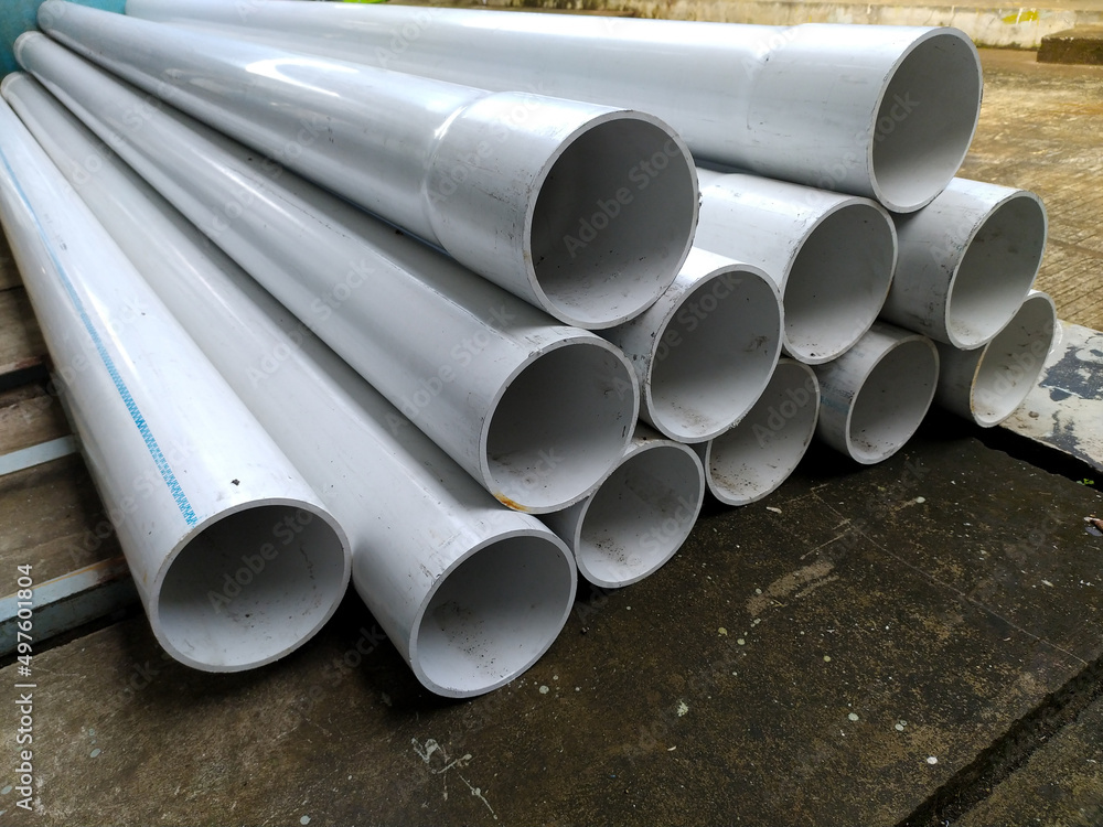 Pile of paralon pipes for industrial work. Indistrial pvc piping. Stock ...