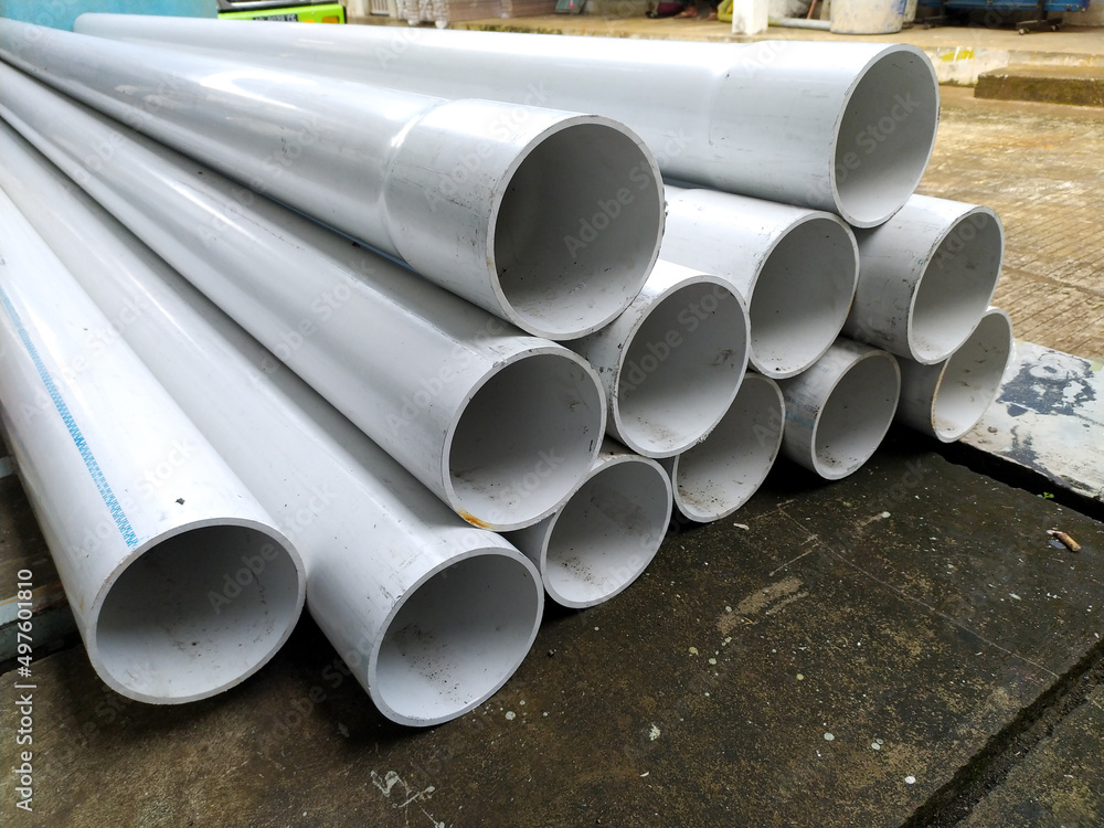 Pile of paralon pipes for industrial work. Indistrial pvc piping. Stock ...