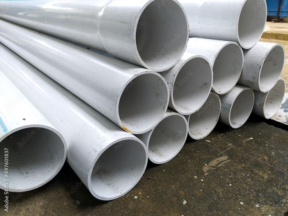 Pile of paralon pipes for industrial work. Indistrial pvc piping. Stock ...