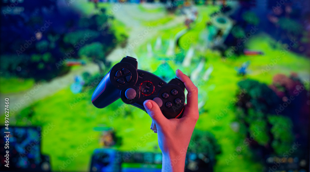 Gamepad on TV background Stock Photo | Adobe Stock