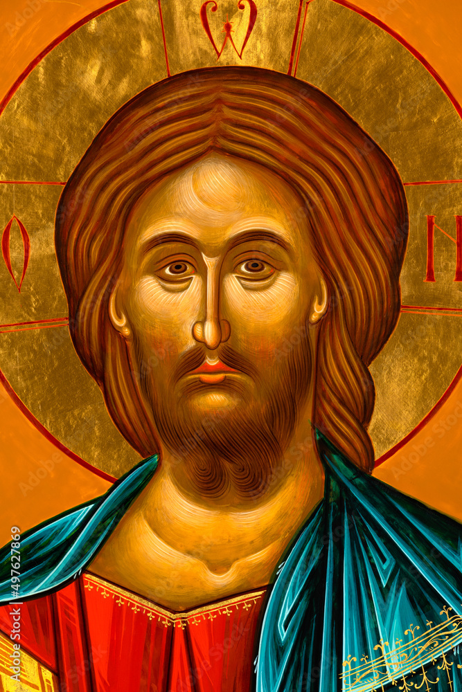 Detail of byzantine or orthodox icon depicting the face of Jesus Christ ...