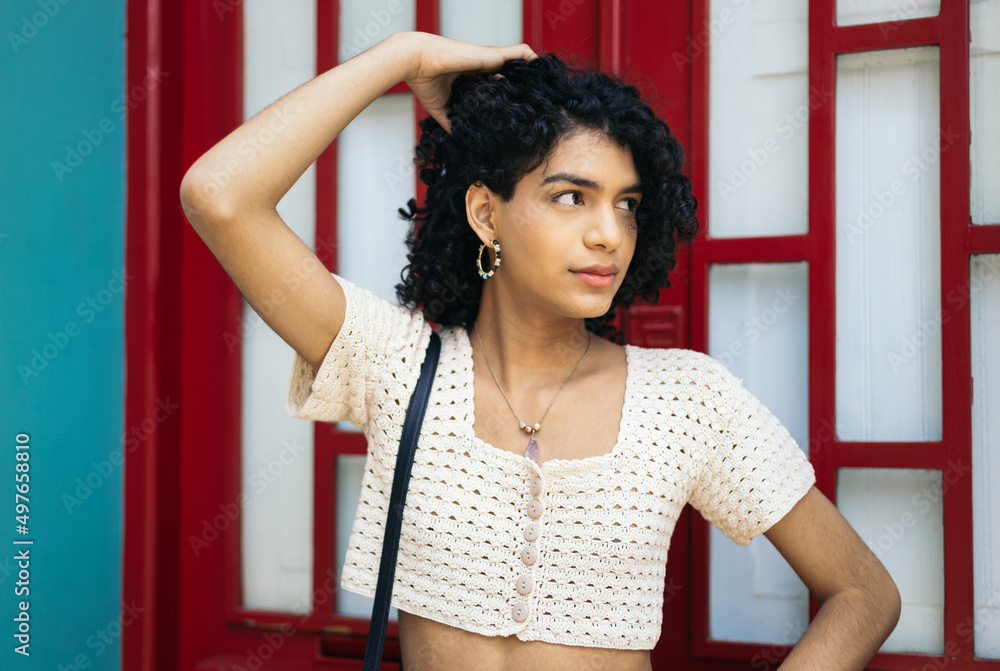 Young transgender woman outdoors Stock Photo | Adobe Stock