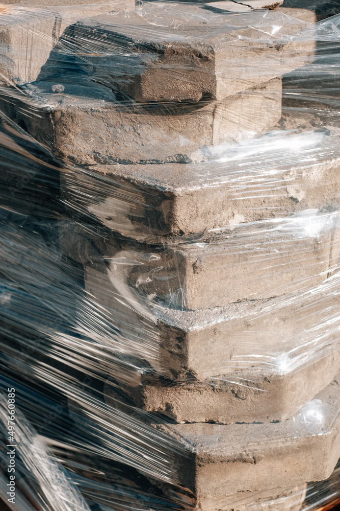Paving slabs wrapped with packaging film Stock Photo | Adobe Stock
