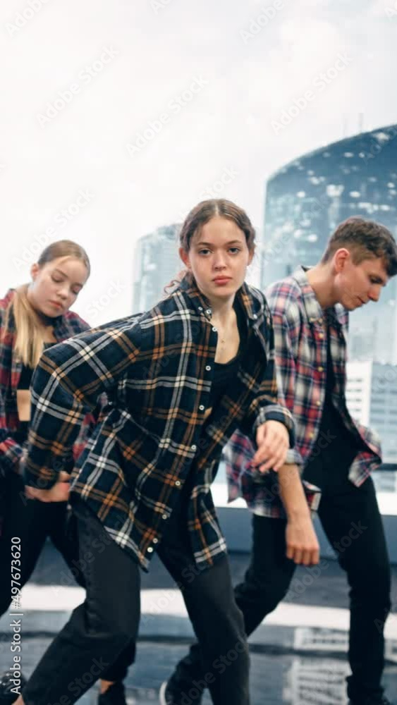 Vertical Screen: Three Professional Dancers Performing a Slow ...