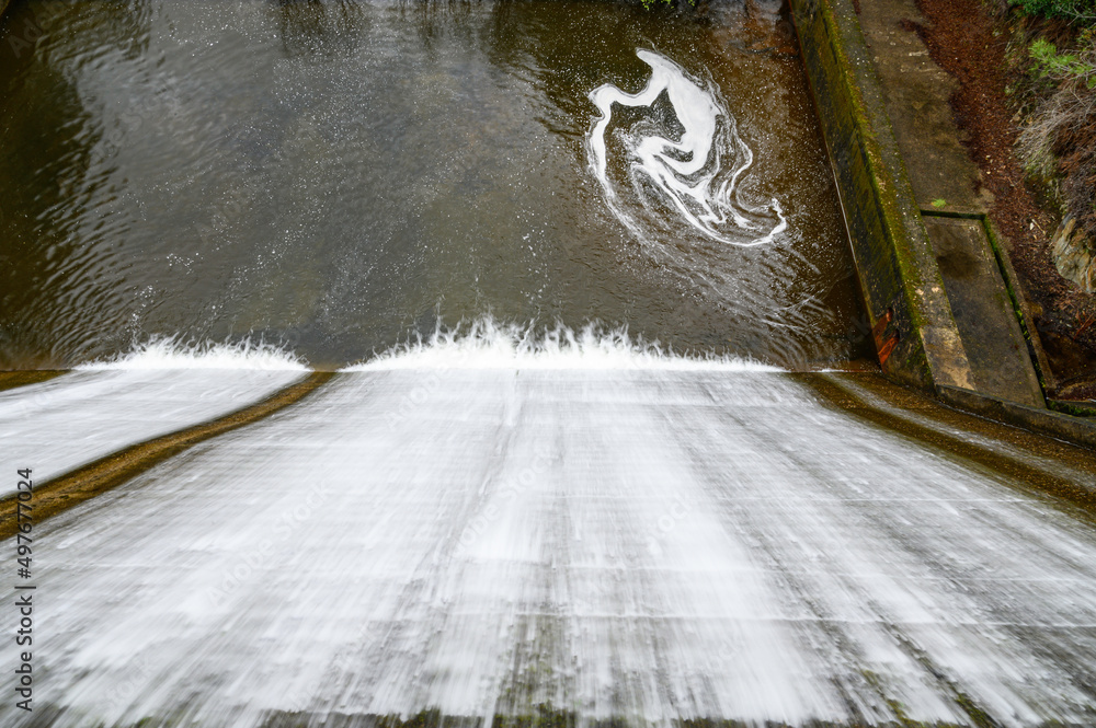 swamp, reservoir, view the fall of water from above the dam of the ...