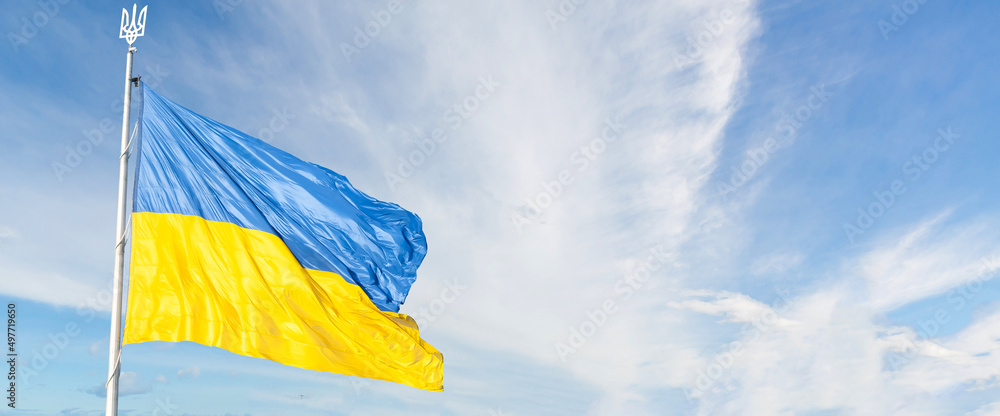 Ukraine flag isolated on the sky with clipping path. close up waving ...