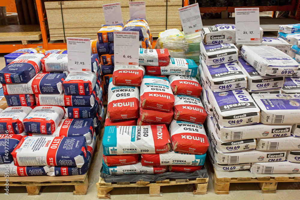 Large selection of building materials are sold in a hardware store ...