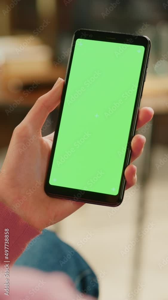 Vertical Screen: Feminine Hand Scrolling Feed on Smartphone with Green ...