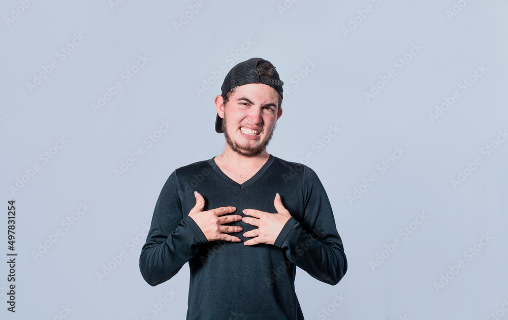 Guy with disgust expression, man with disgust expression with hands on ...