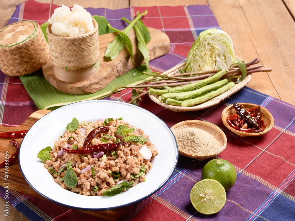 Authentic Thai food called "Lab moo" and ingredients. Pork dishes and ...