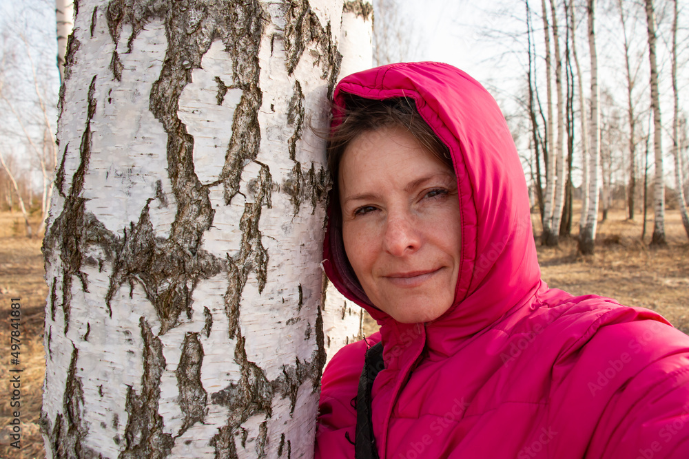 Forest health or nature and human healing concept. A woman holds her ...