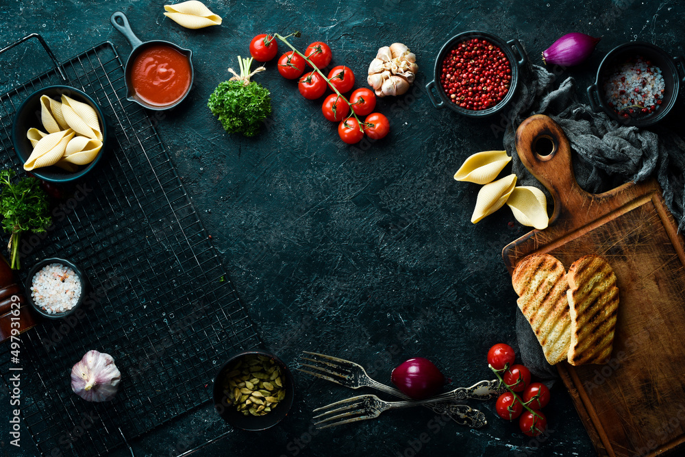 Cooking. Background with vegetables, spices, herbs and kitchen utensils ...