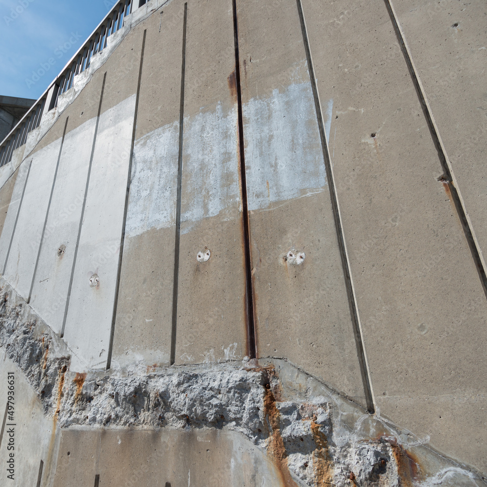 concrete wall with chiseled out detail and sky Stock Photo | Adobe Stock
