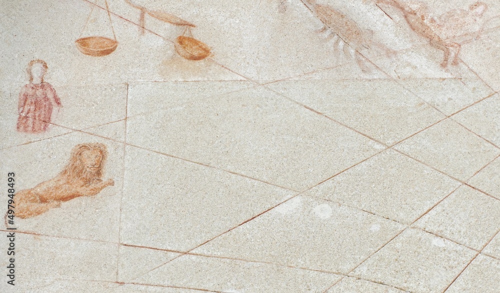 Antique vintage wall with painted lion, human figure and balance scale ...