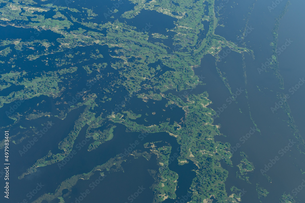 Aerial photo of the Amazon rainforest and the Amazon River basin in ...