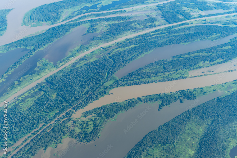 Aerial photo of the Amazon rainforest and the Amazon River basin in ...