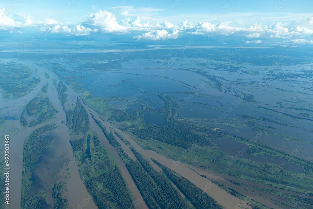 Aerial photo of the Amazon rainforest and the Amazon River basin in ...