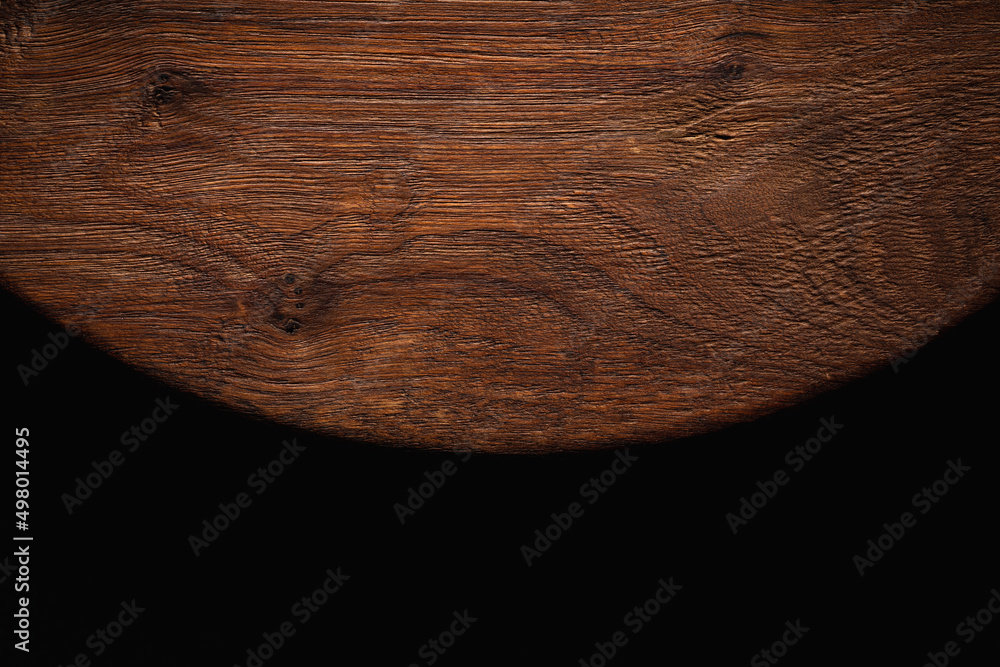 Half round wooden table top on black background. Wood plank texture ...