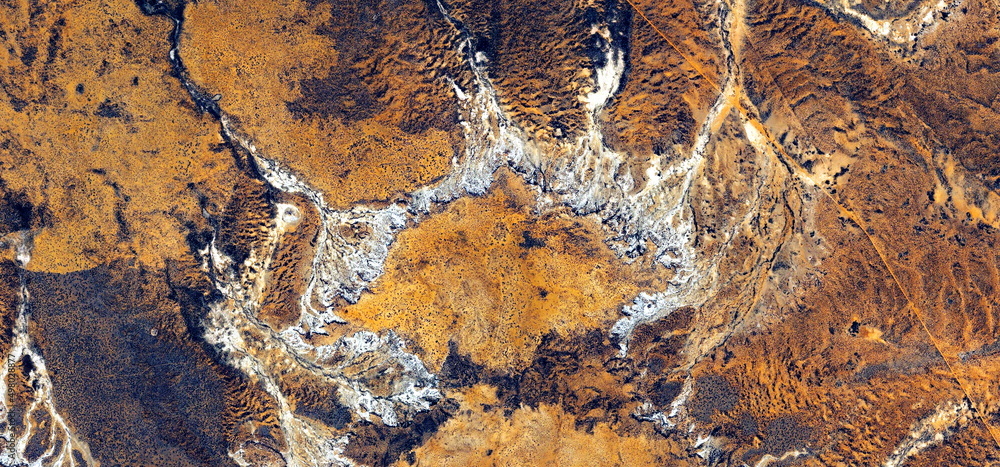 abstract landscape of the deserts of Africa from the air emulating the ...
