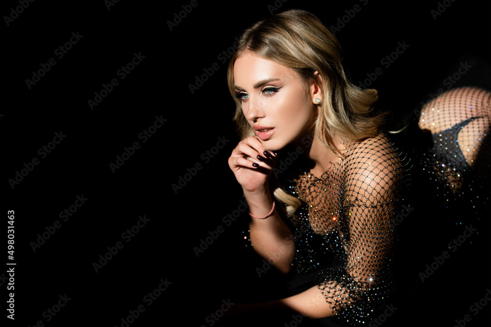 Seductive woman face. Sexy pretty woman model on black background. Sensual girl with sexy body ...