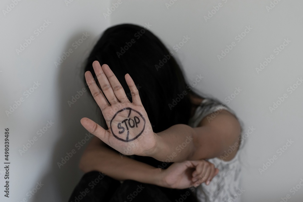 Woman showing 'STOP' sign on hand to empower, awareness about violence ...