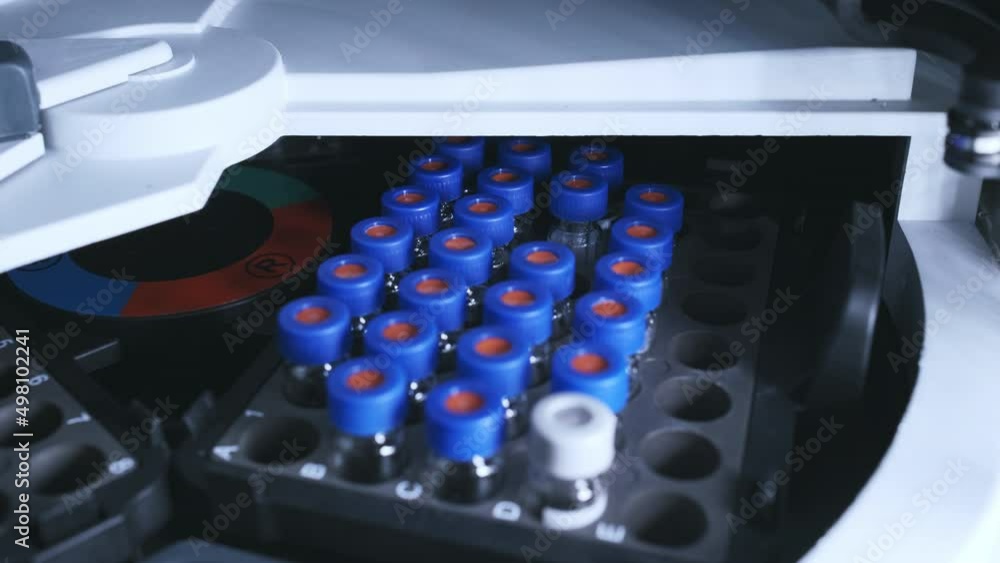 Glass vials in high-performance liquid chromatography autosampler at ...