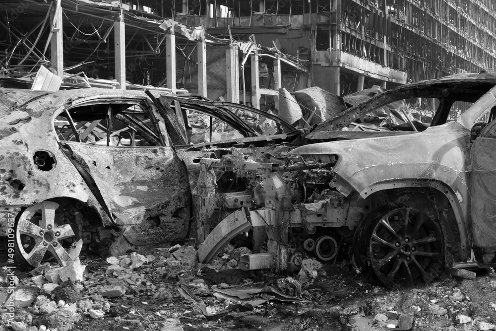 Aftermath shell of civilian bombed city damage car. 2022 Russian ...