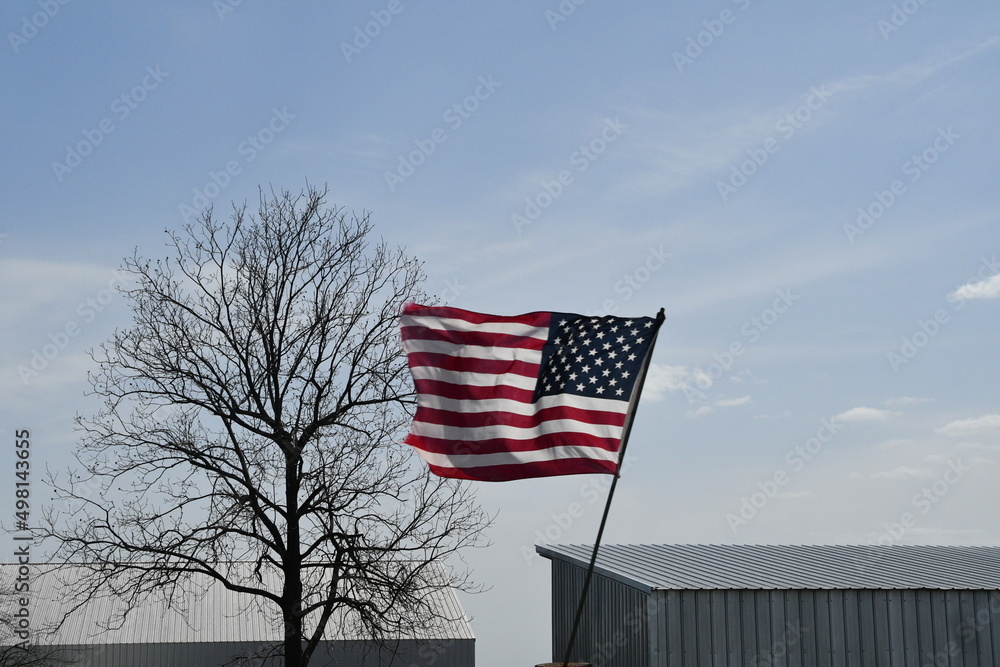 American Flag on by Barns in a Farm Field Stock Photo | Adobe Stock