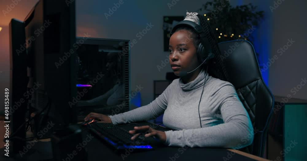 Gamer girl loses in video game, shouts to team members waving hands ...