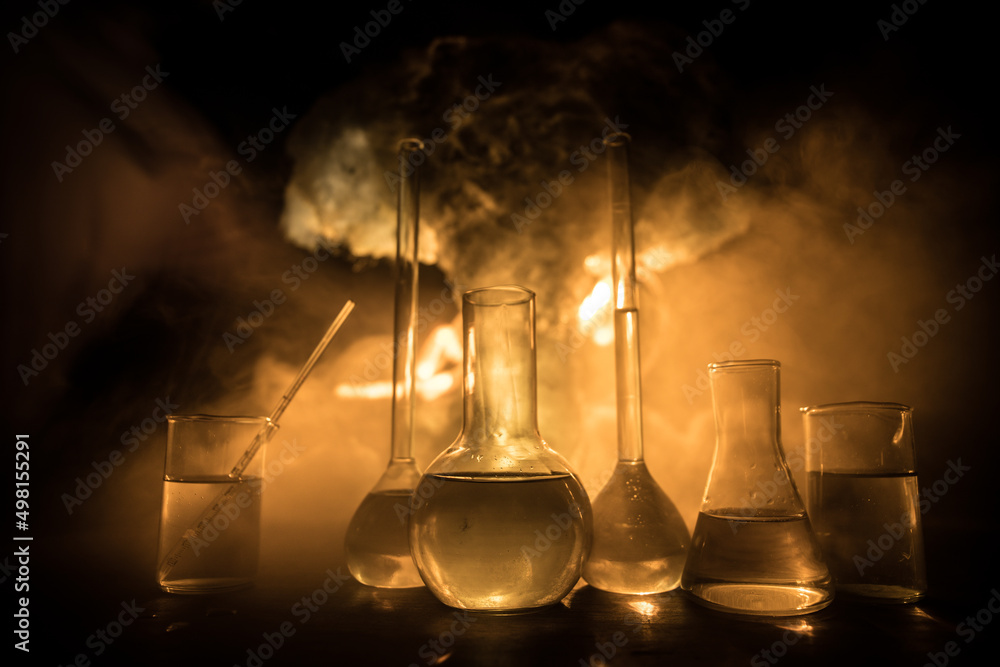 Test glass flask with solution in research laboratory. Science and ...