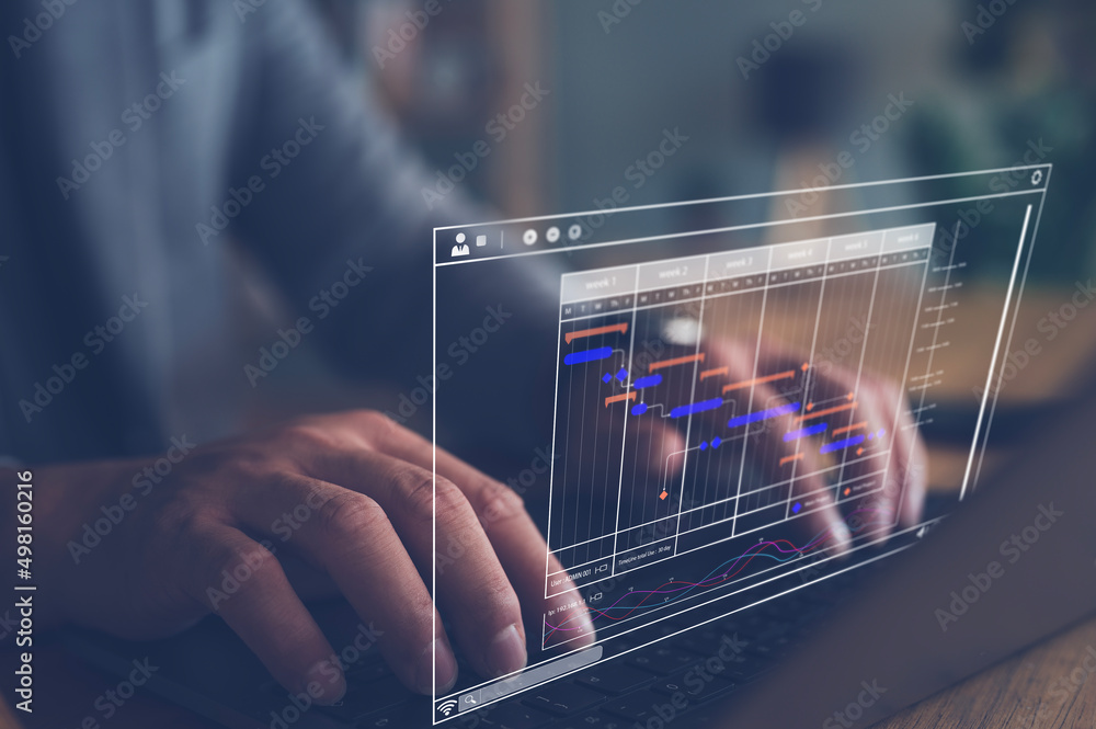 Analyst working with computer in Business Analytics and Data Management ...