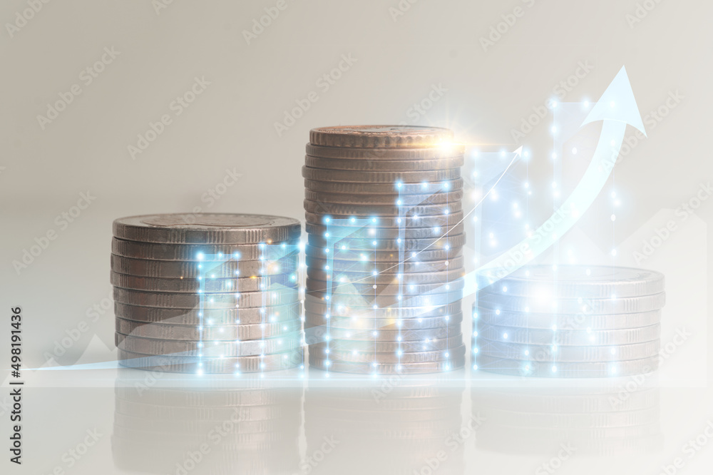 Coins piled up as levels gradually increased showing corporate business ...