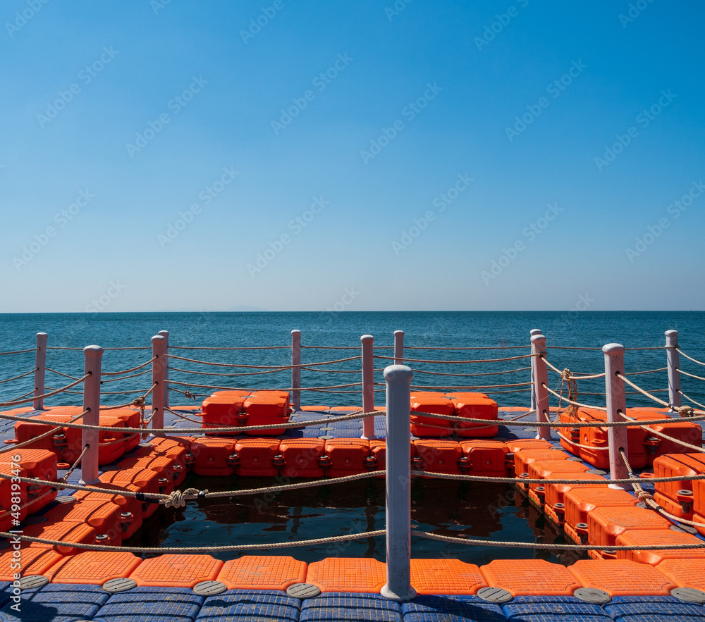 Floating piers along shore are place for tourists walk. Mooring boat ...