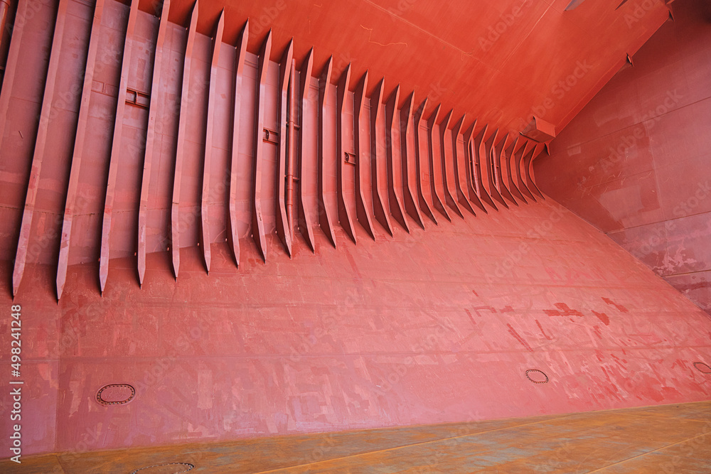 View of bulk carrier cargo hold's side framing with hopper plating ...