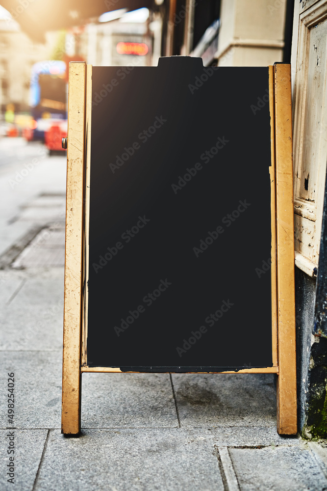 Guess whats on our menu today. Shot of a sidewalk sign with space for ...